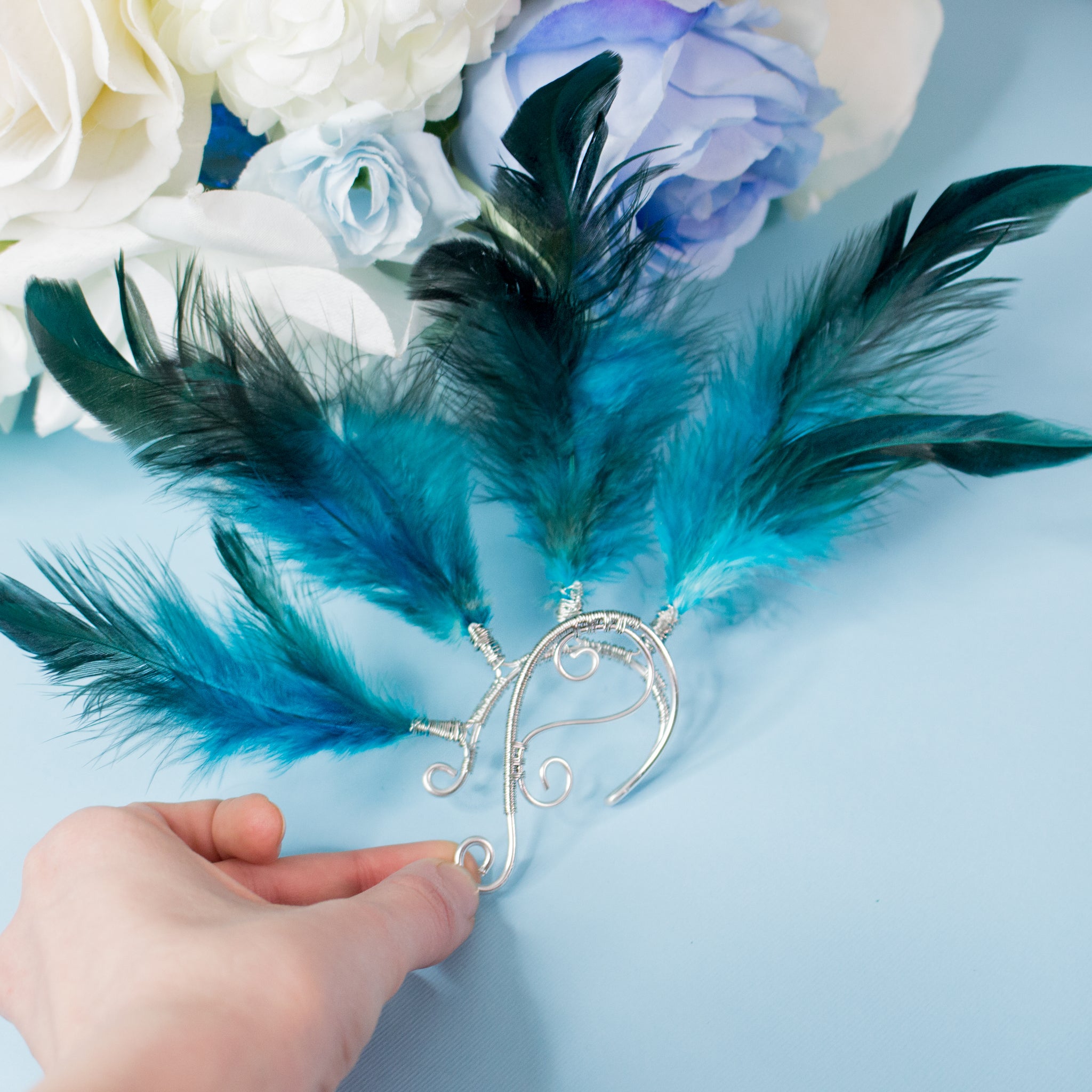 blue feather cuffs