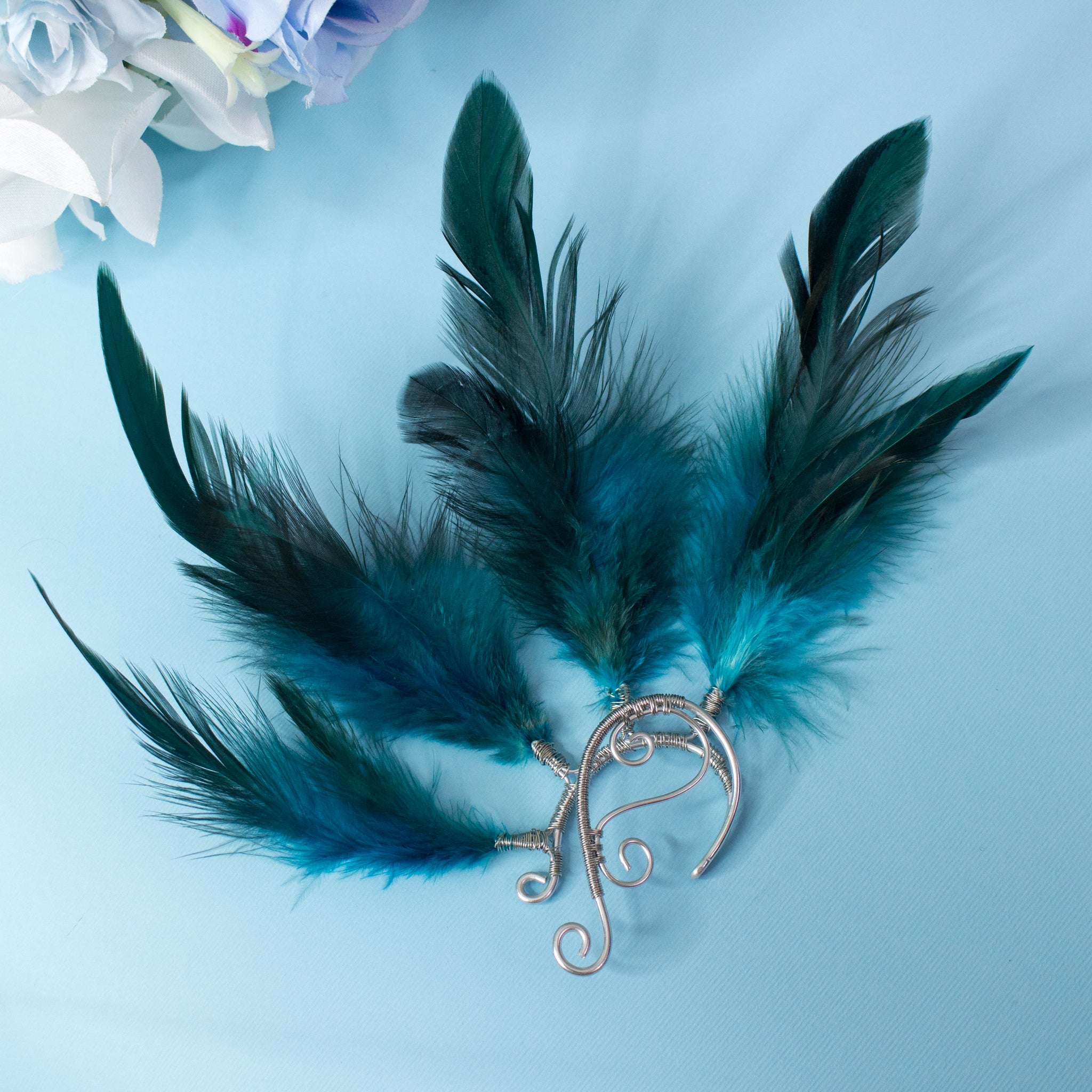 blue feather cuffs
